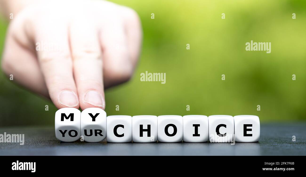 Hand turns dice and changes the expression "your choice" to "my choice ...