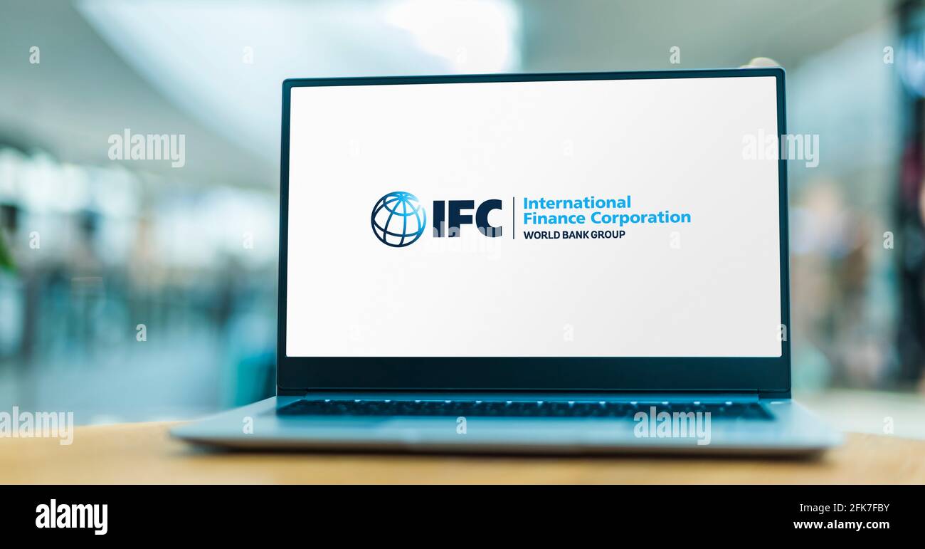 POZNAN, POL - APR 15, 2021: Laptop computer displaying logo of IFC, an ... POZNAN, POL - APR 15, 2021: Laptop computer displaying logo of IFC, an ...