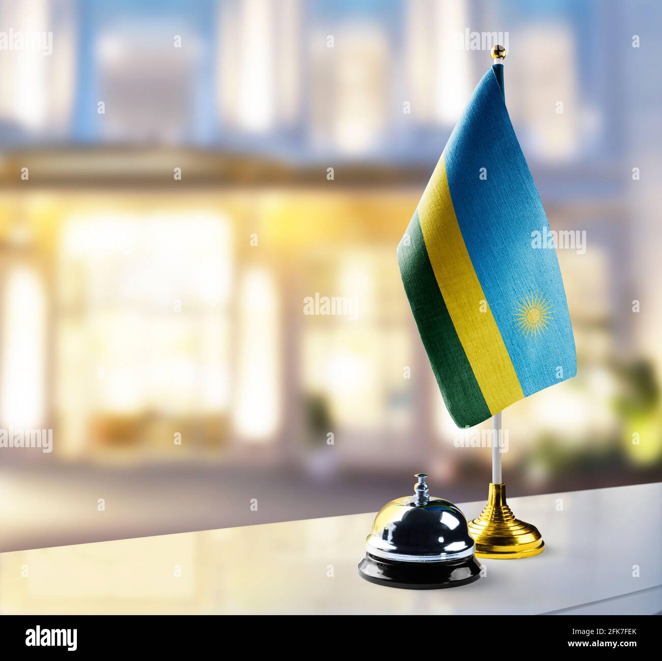 Rwanda flag on the reception desk in the lobby of the hotel Stock Photo ...