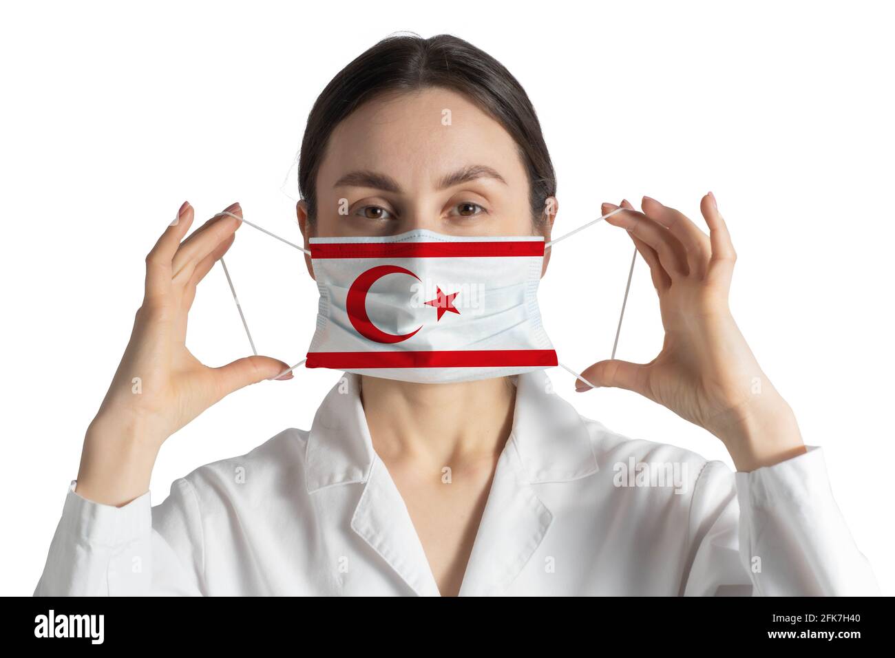Respirator with flag of Turkish Republic of Northern Cyprus Doctor puts ...