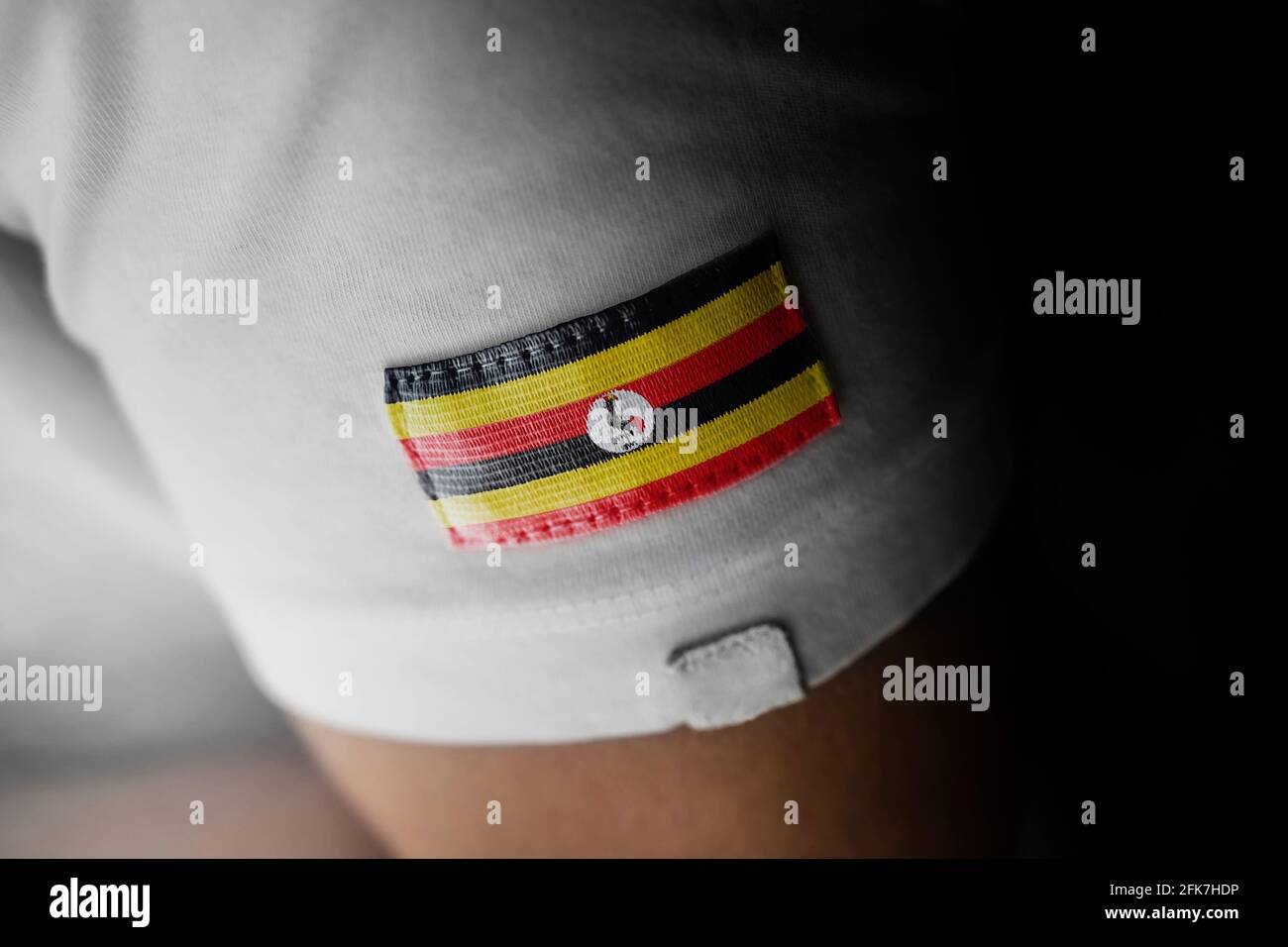 Patch of the national flag of the Uganda on a white t-shirt Stock Photo ...