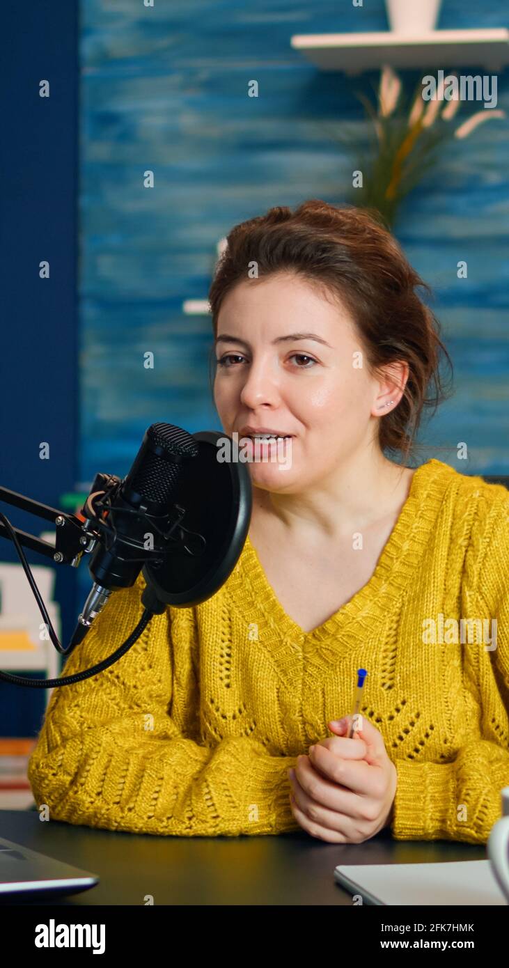 Influencer doing vlog production with professional gear in home studio ...