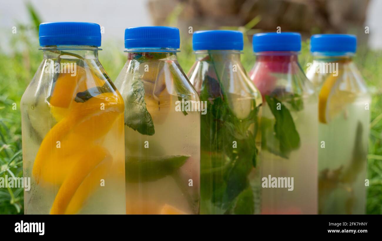 Variety of detox water on a plastic container, health concept Stock ...