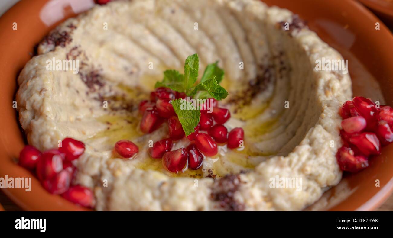 Typical Middle Eastern ground eggplant dip known as mutabbal with ...