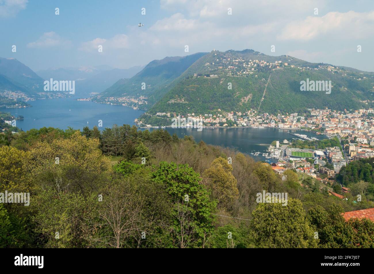 Panoramic aerial view of the city of Como facing the famous Lake Como ...