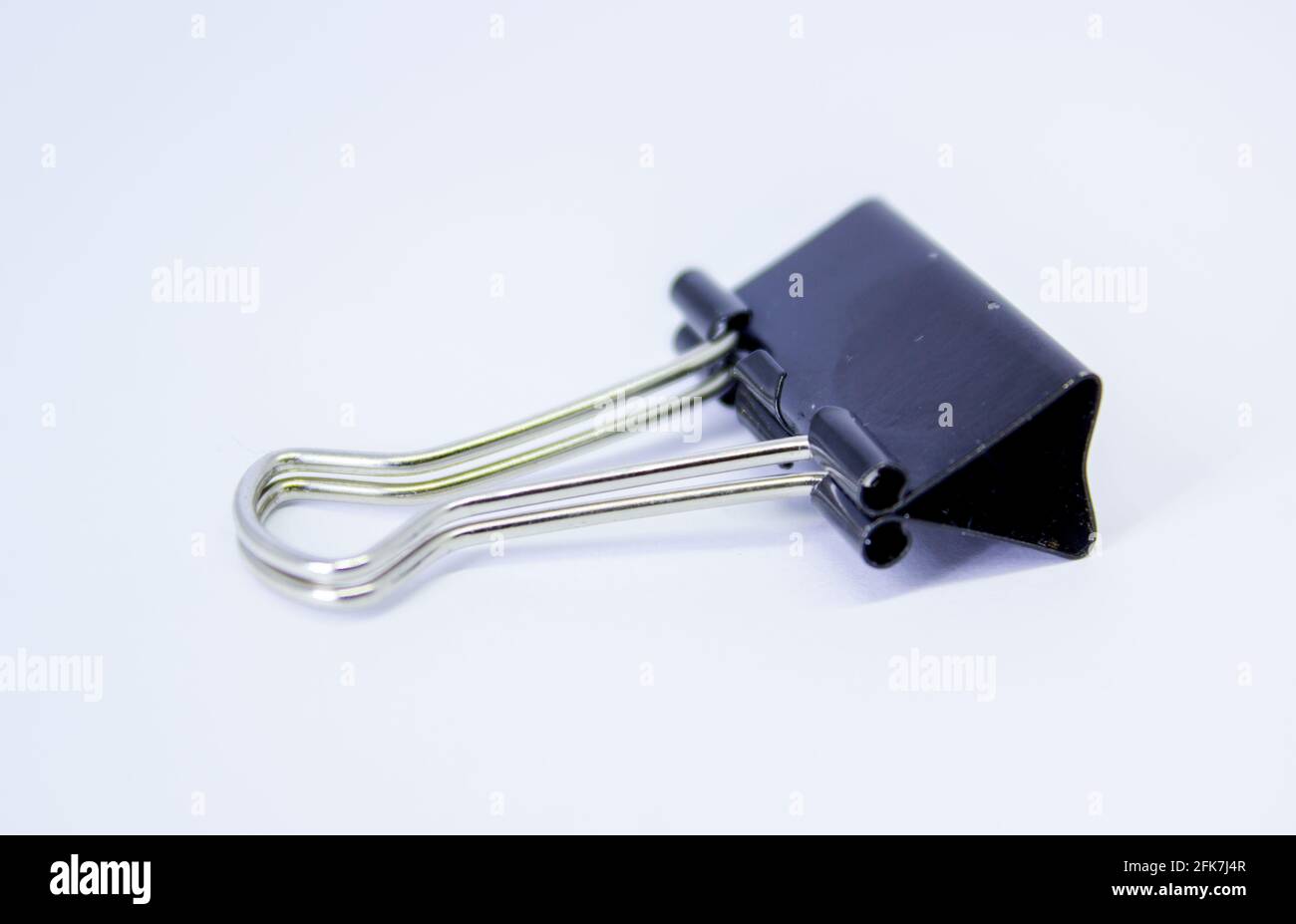 School stationary, Black paper clip isolated on white background Stock ...