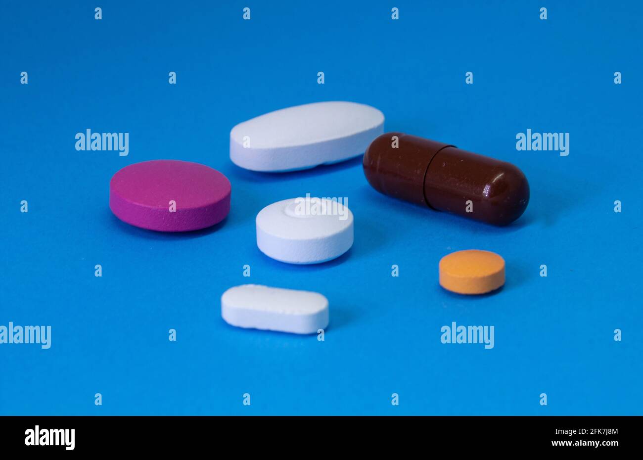 Pharmacy and Hospital theme. mix of pills and capsules with ...