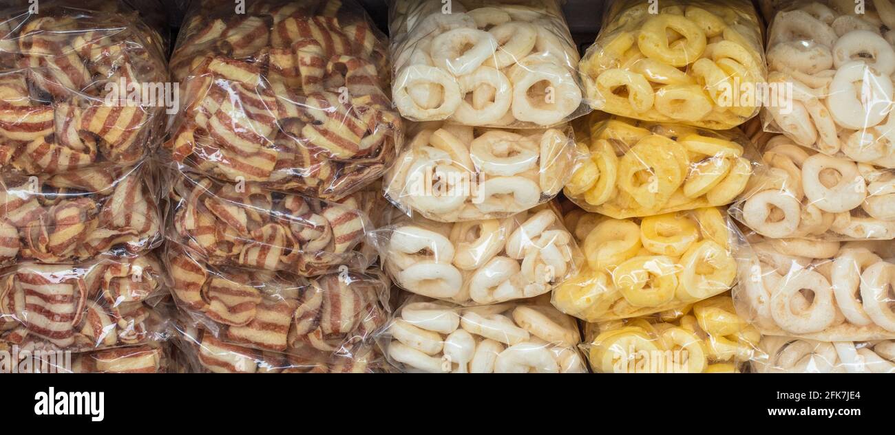Closeup of rows of packaged snacks in a supermarket Stock Photo - Alamy