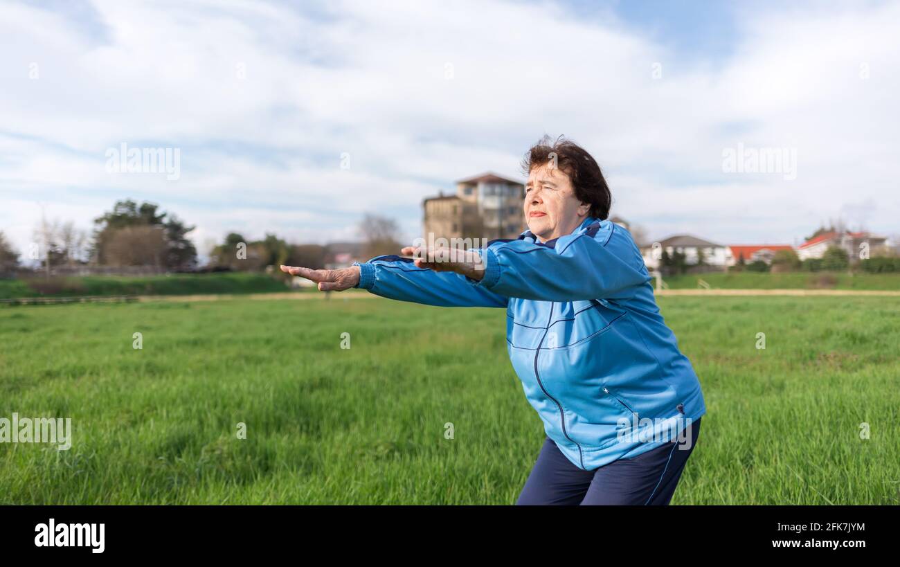 Mature woman squat exercise High Resolution Stock Photography and ...