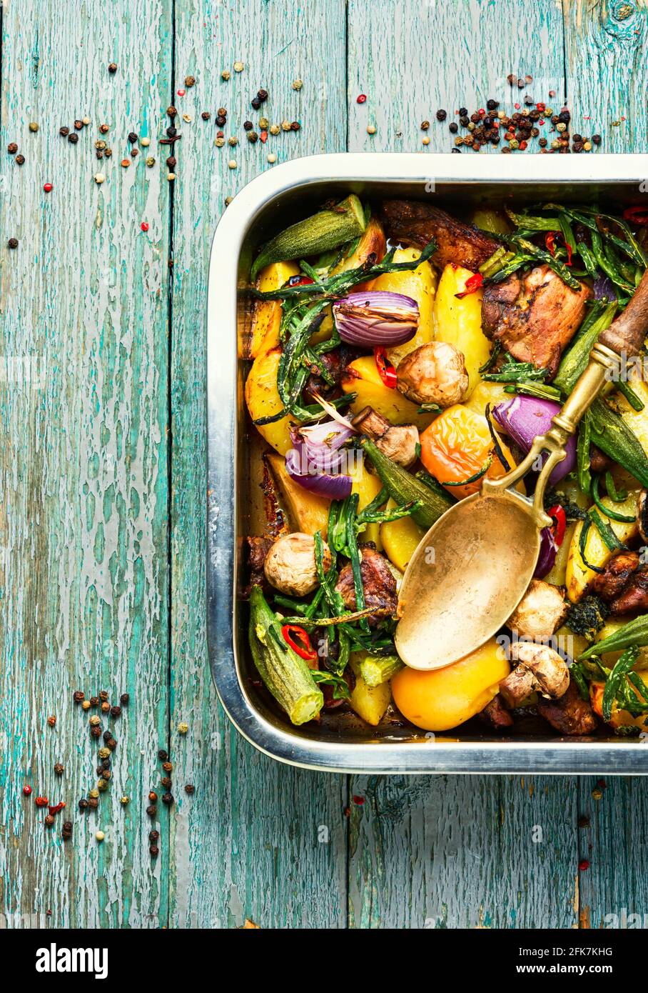 Grilled meat and vegetables on rustic wooden background.Roasted meat ...
