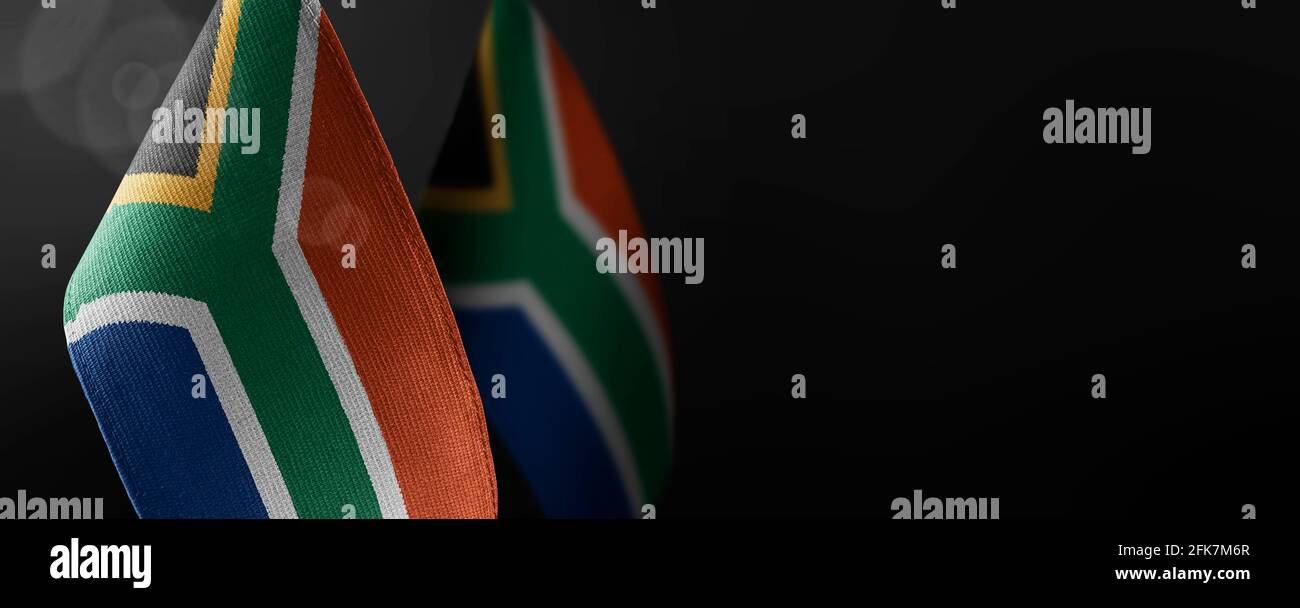 Small national flags of the South Africa on a dark background Stock ...
