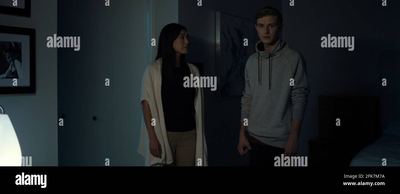 CATHERINE HAENA KIM and JOHN BERCHTOLD in A HARD PROBLEM (2021), directed by HAZART. Credit ...