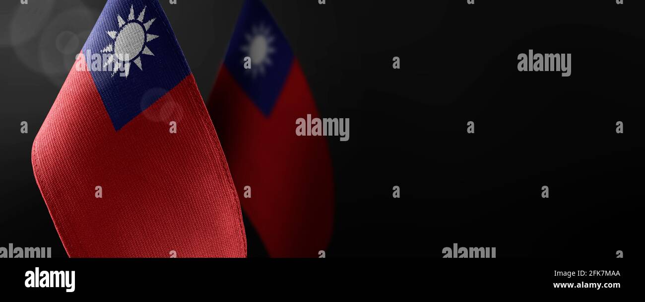 Small national flags of the Taiwan on a dark background Stock Photo - Alamy
