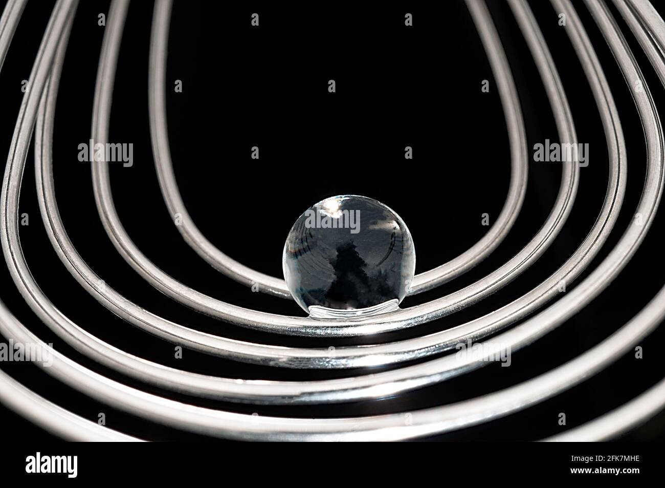 Sinuous waves in the kitchen universe in black background Stock Photo ...