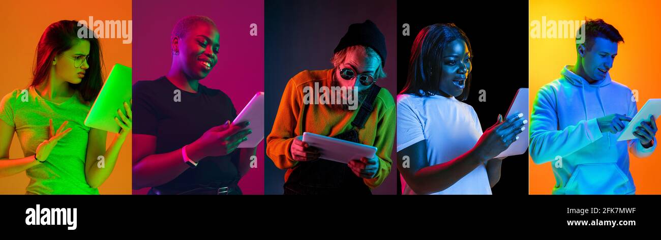 Portrait of group of people on multicolored background in neon light ...