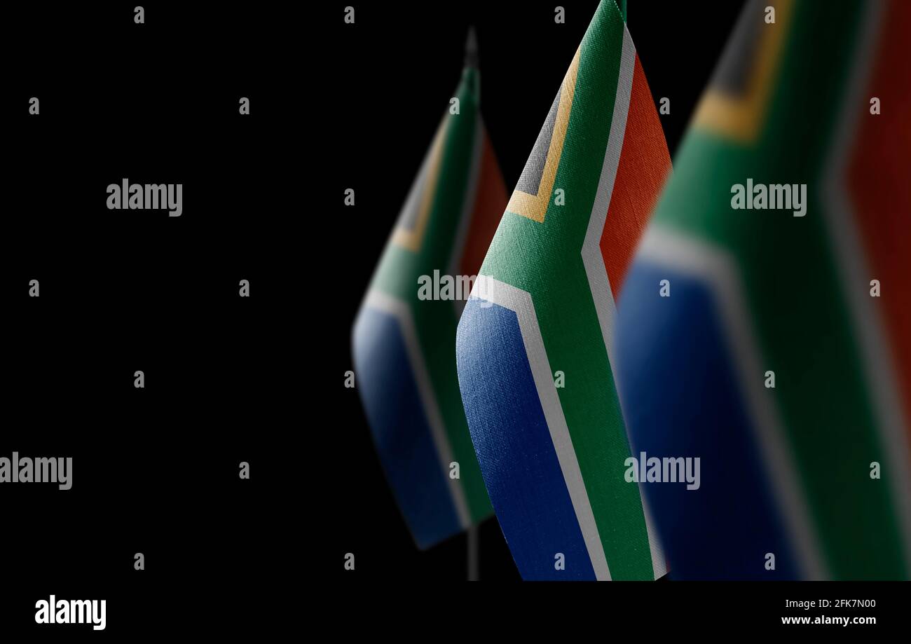 Small national flags of the South Africa on a black background Stock ...