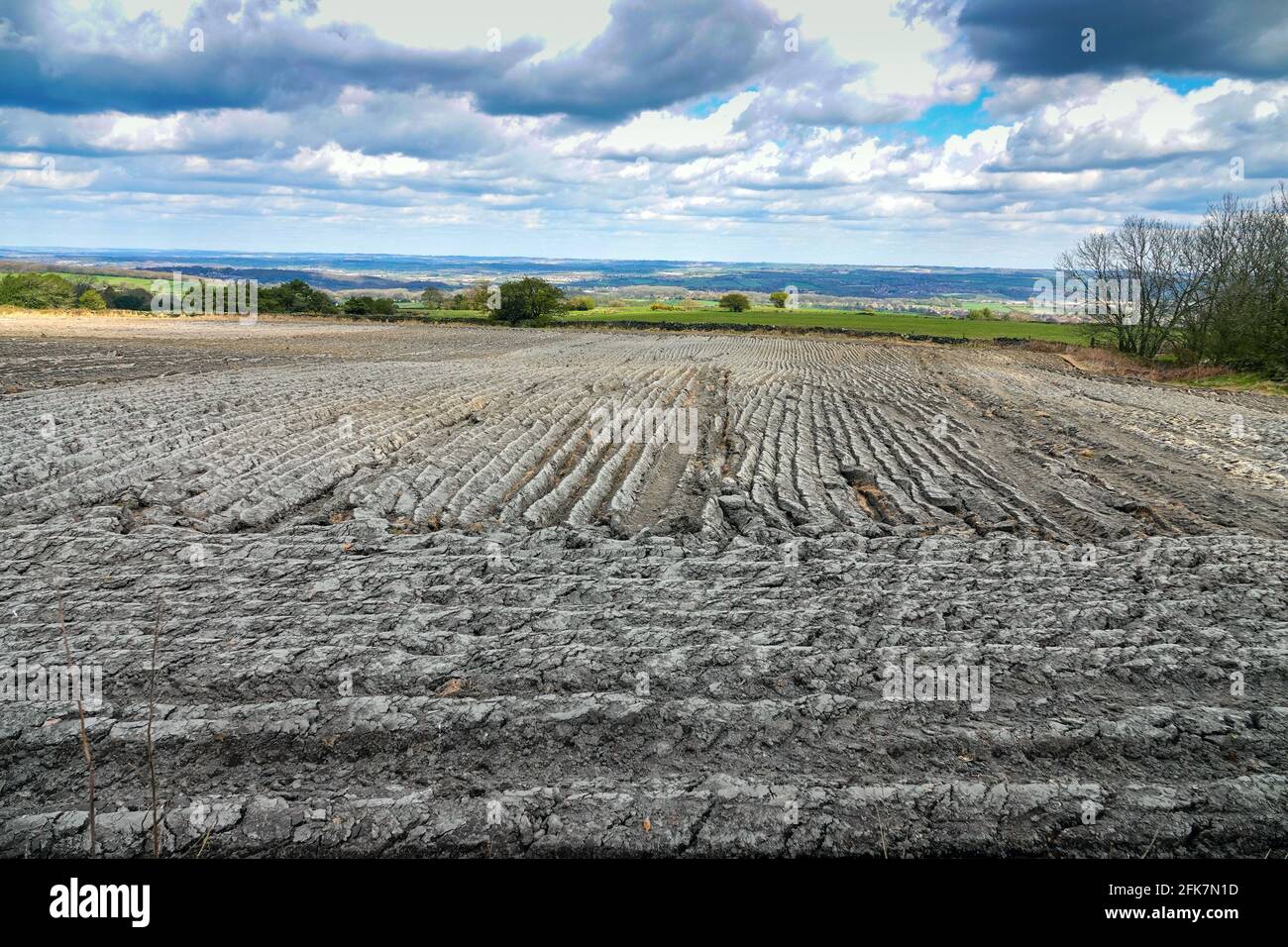 Ploughed field with furrows in pale clay soil, Matlock, Derbyshire ...