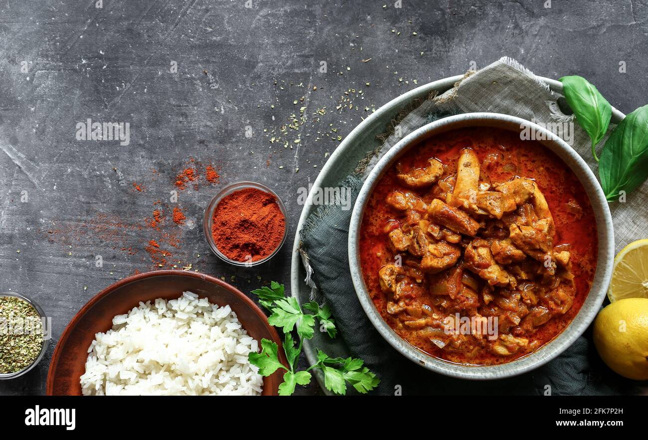Traditional curry and ingredients. Tikka Masala chicken and rice ...