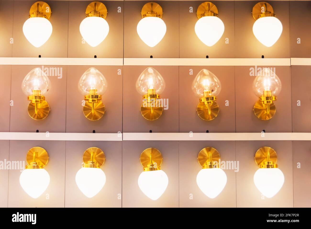 Multiple row of wall mounted luminaires at exhibition demonstration ...