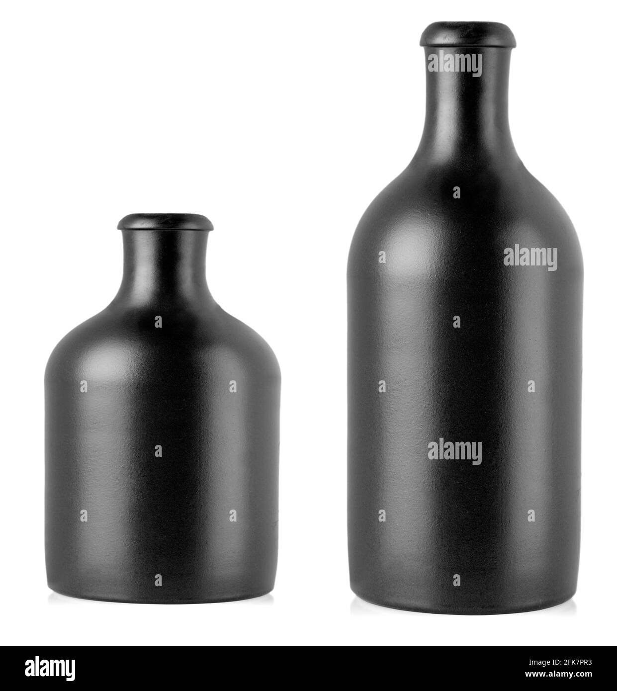 The dark bottles with alcoholic beverage k isolated on white background ...