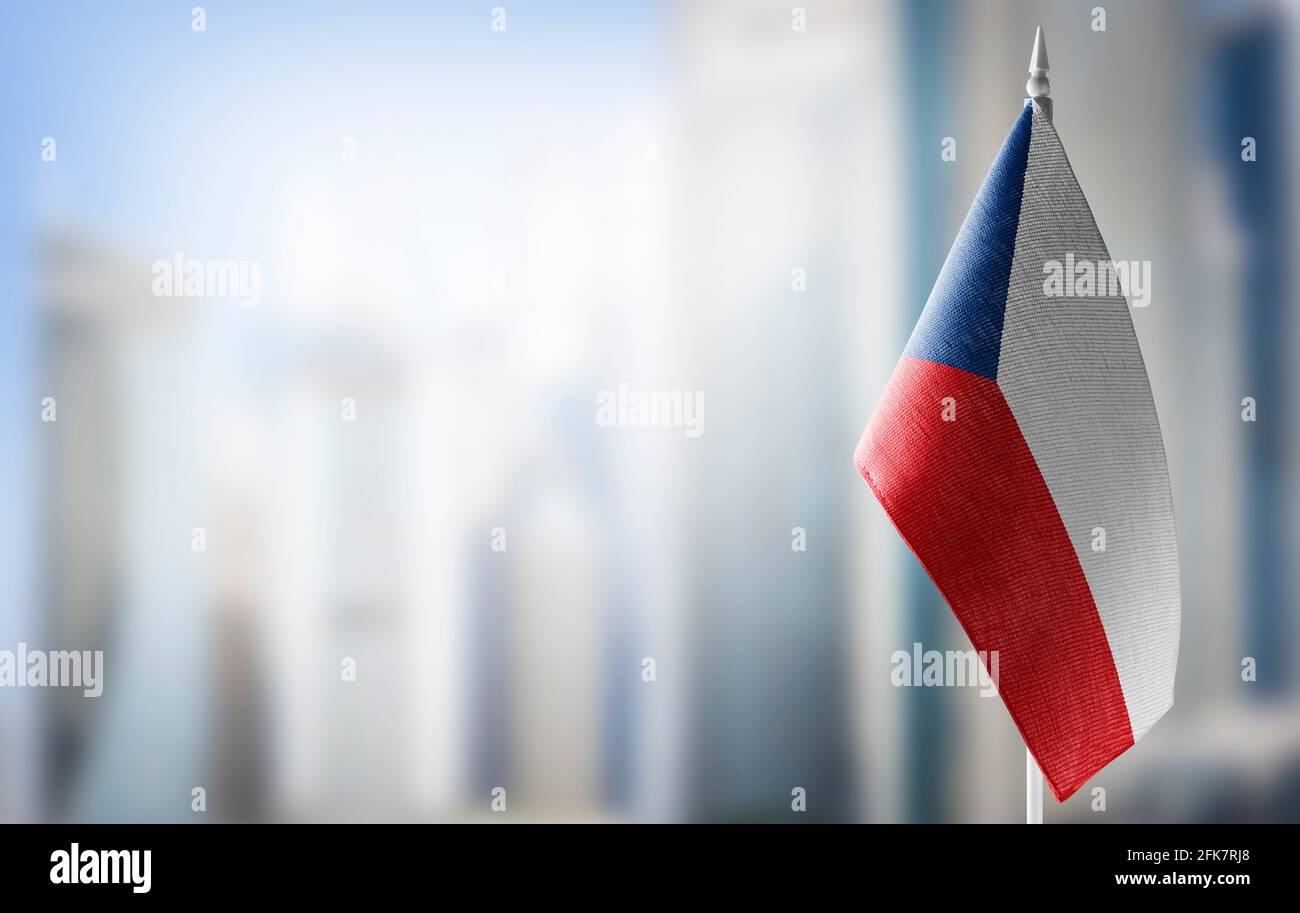 A small flag of Czechia on the background of a blurred background Stock ...