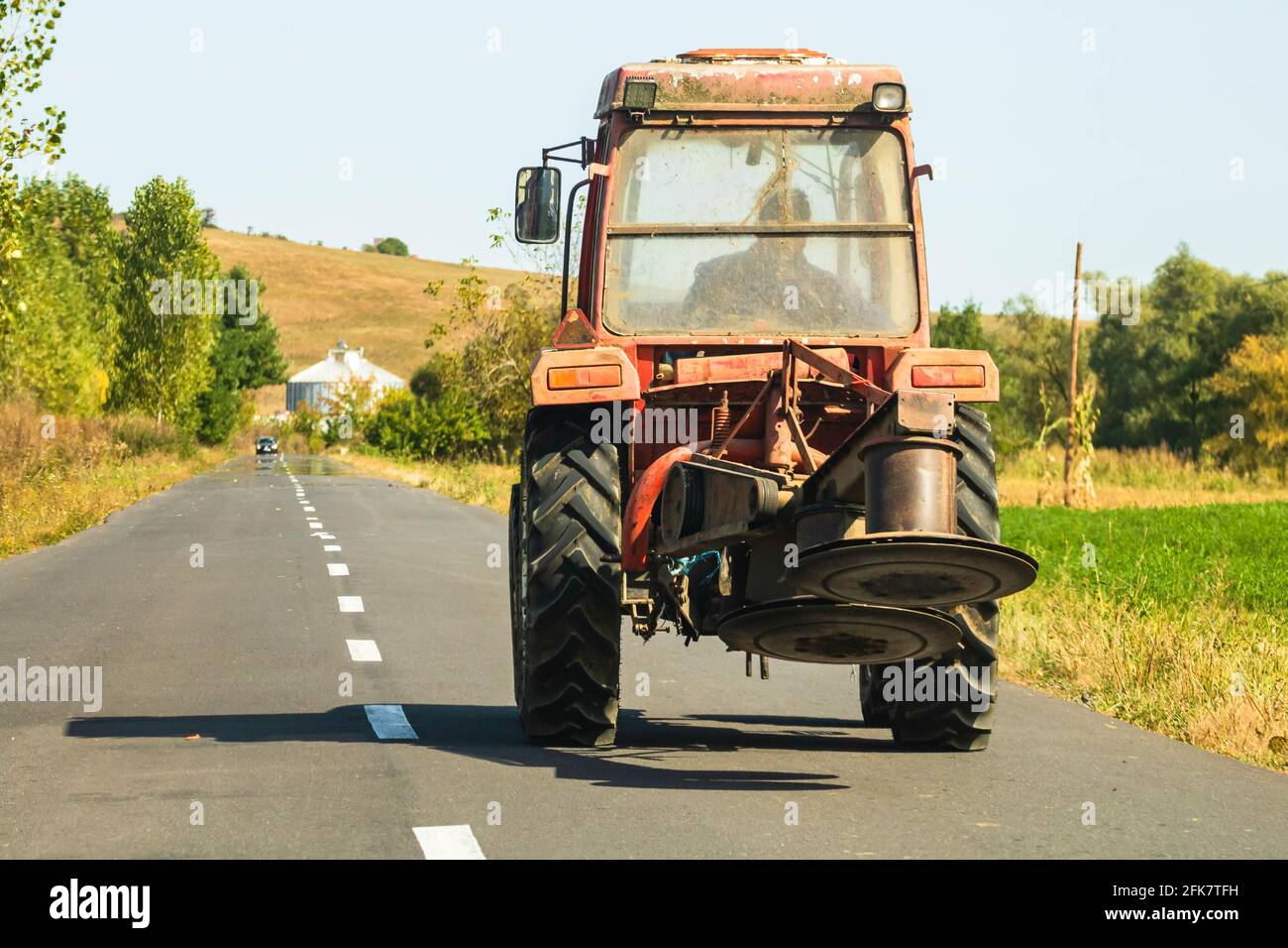 Agricultural tractor on road in Viscri, Romania, 2021 Stock Photo - Alamy