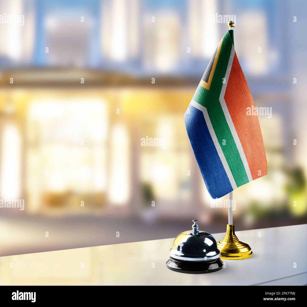 South Africa flag on the reception desk in the lobby of the hotel Stock ...