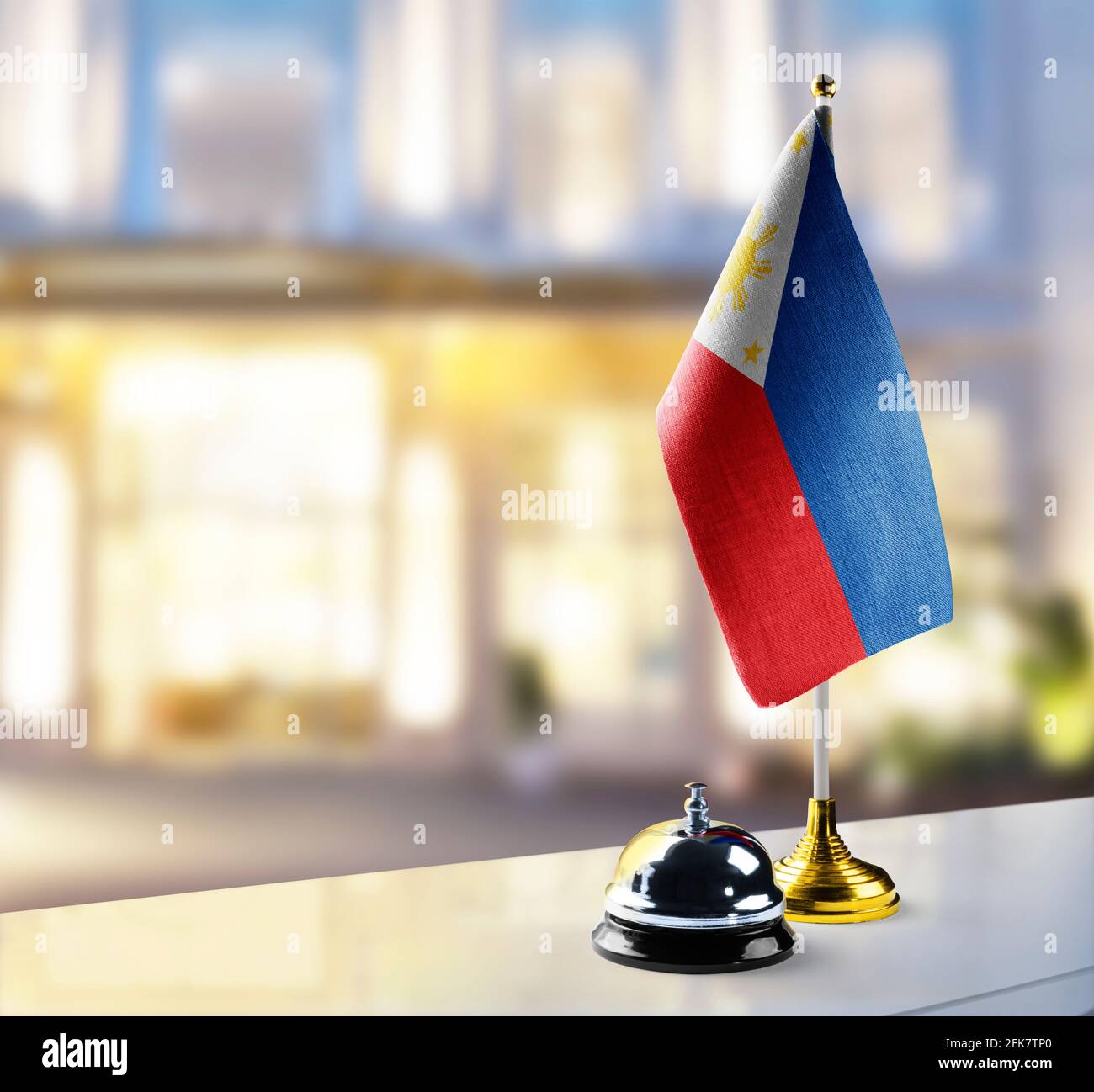 Philippines flag on the reception desk in the lobby of the hotel Stock ...