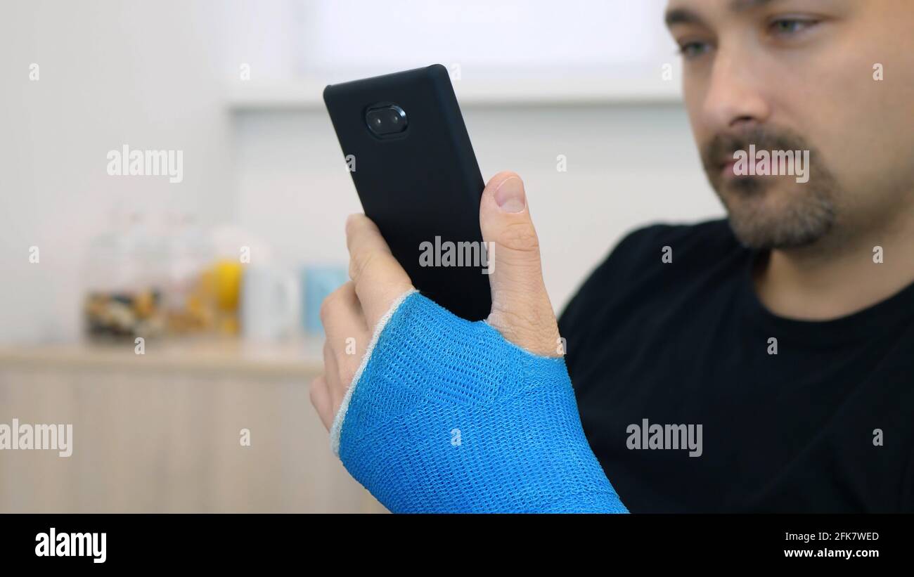 Broken arm and wrist in plaster hi-res stock photography and images - Alamy
