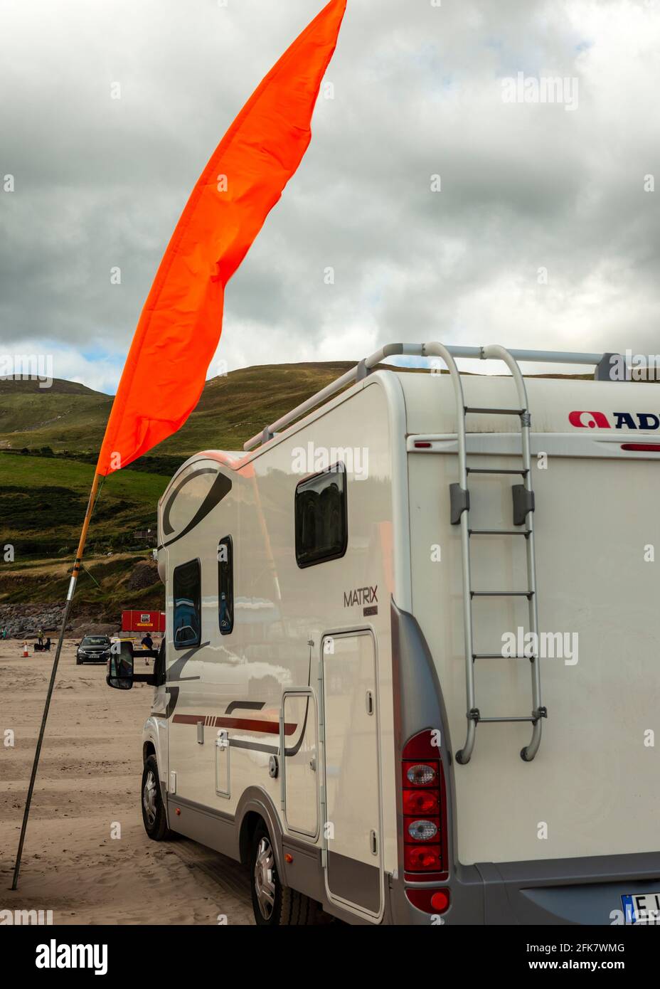 RV caravan with Italian number plate on a dull cloudy summer day at the ...