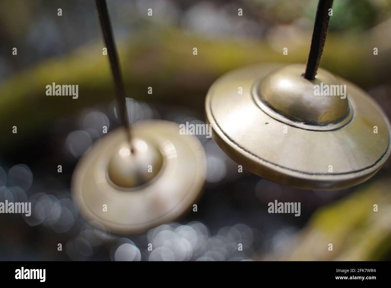Cymbals close up for sound healing therapy Stock Photo - Alamy