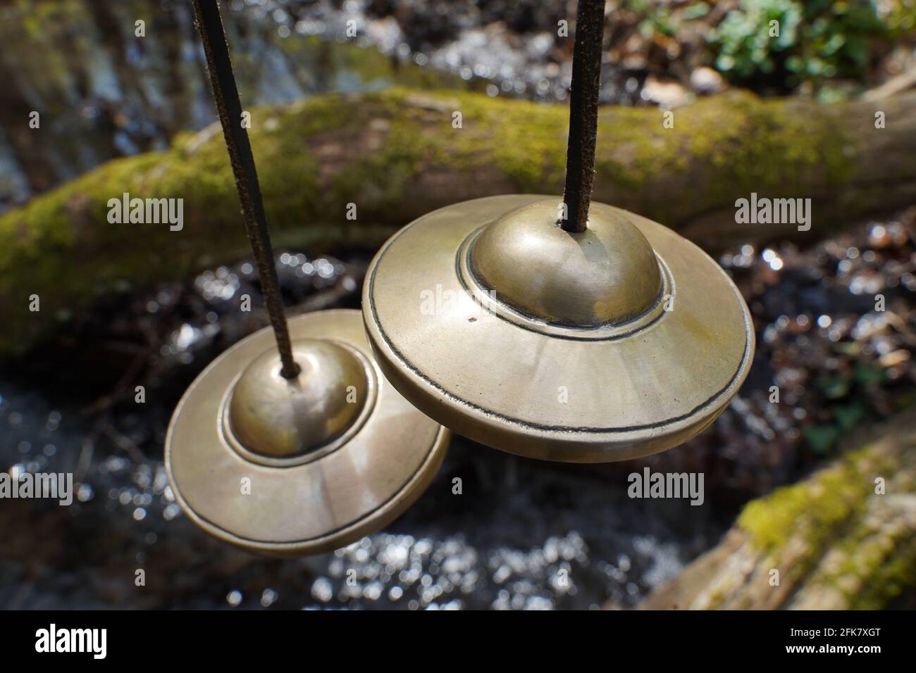 Cymbals close up for sound healing therapy Stock Photo - Alamy