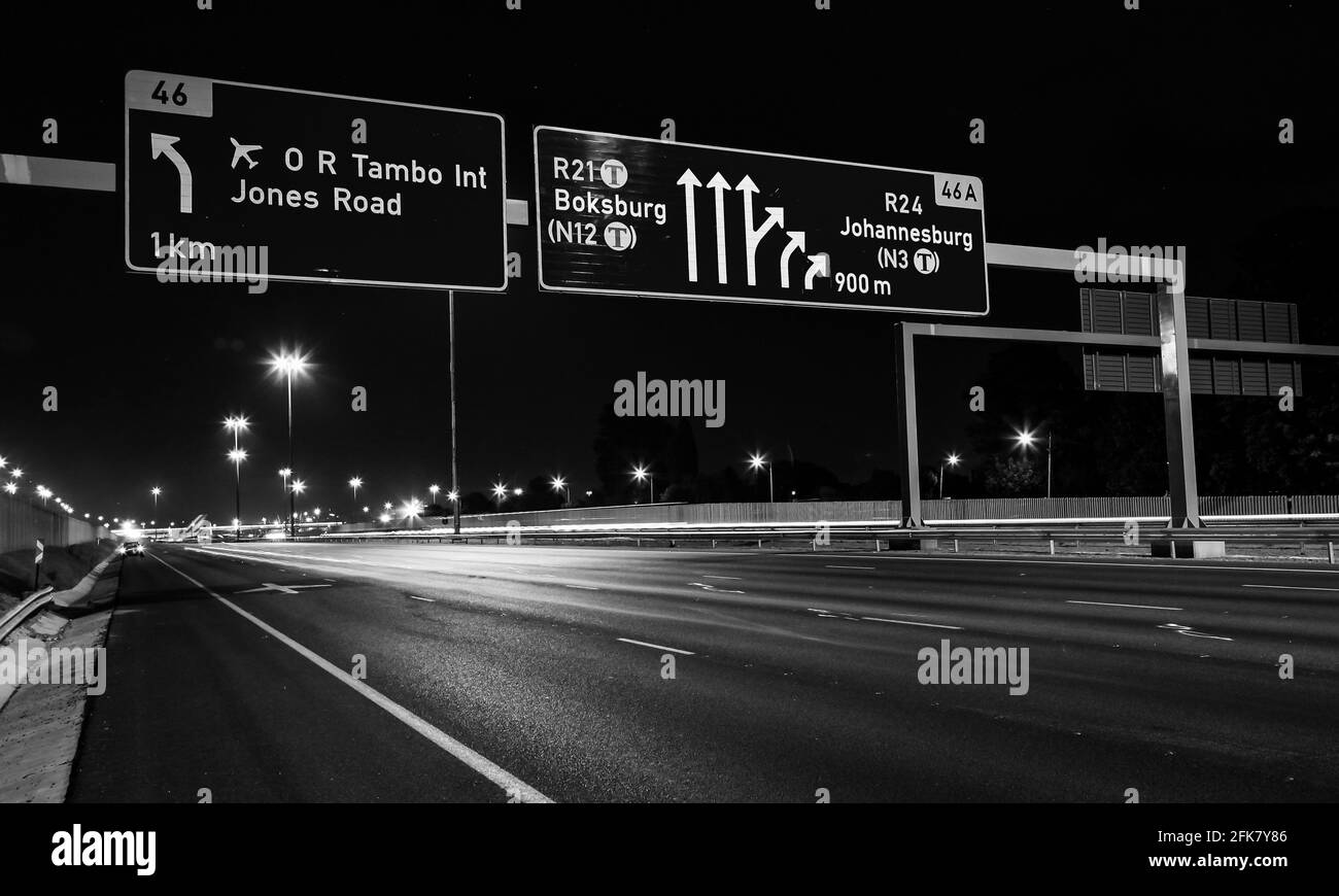 Road signs motorway junction sign Black and White Stock Photos & Images ...