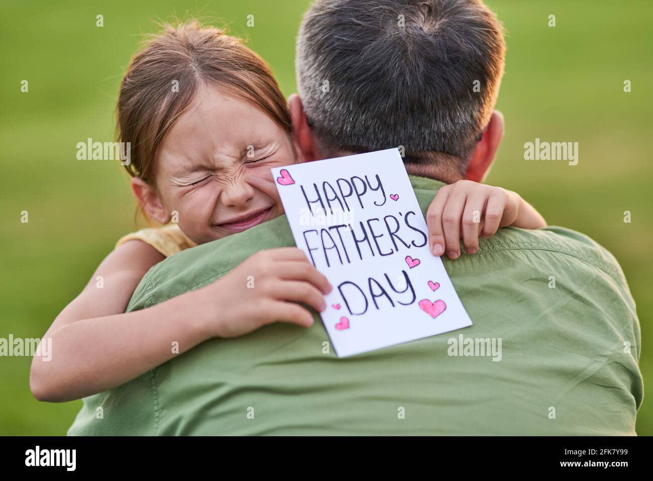 Love you daddy! Cute little girl looking emotional while greeting her ...