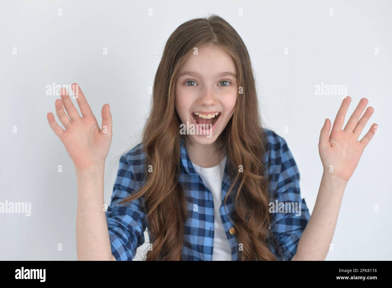 Cute happy girl posing isolated on white background Stock Photo - Alamy