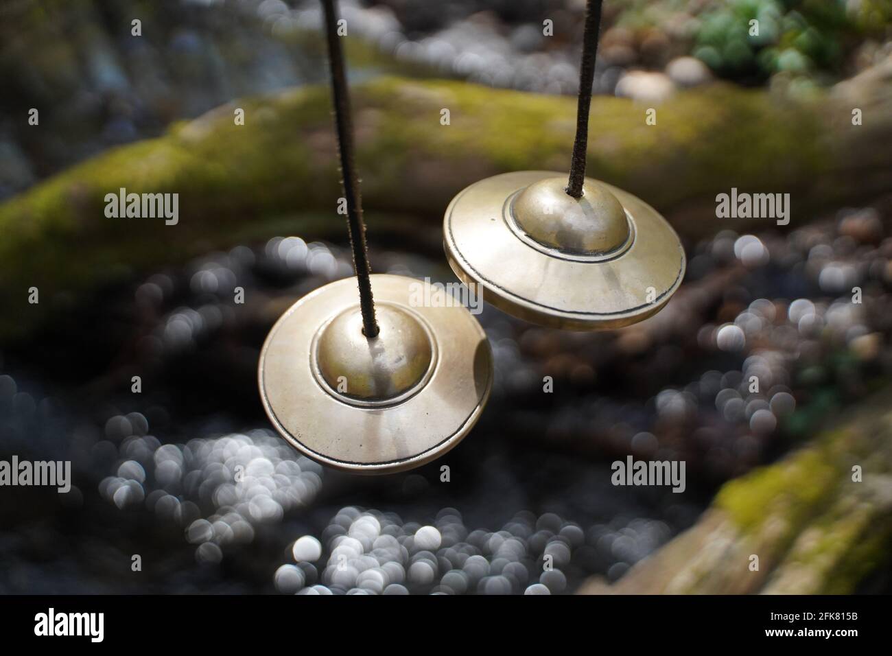 Cymbals close up for sound healing therapy Stock Photo - Alamy