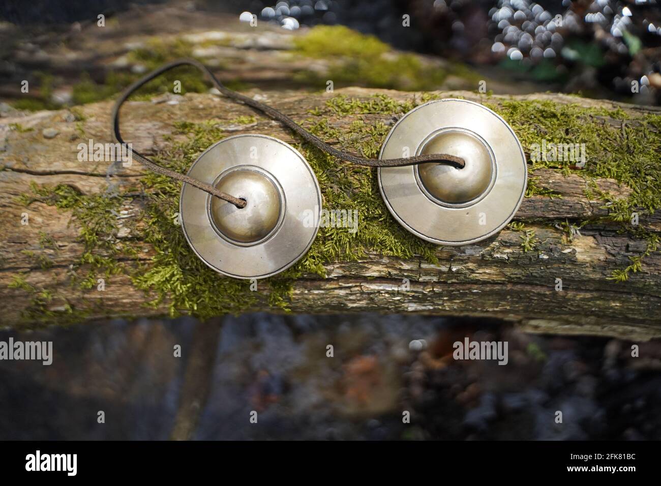 Cymbals close up for sound healing therapy Stock Photo - Alamy