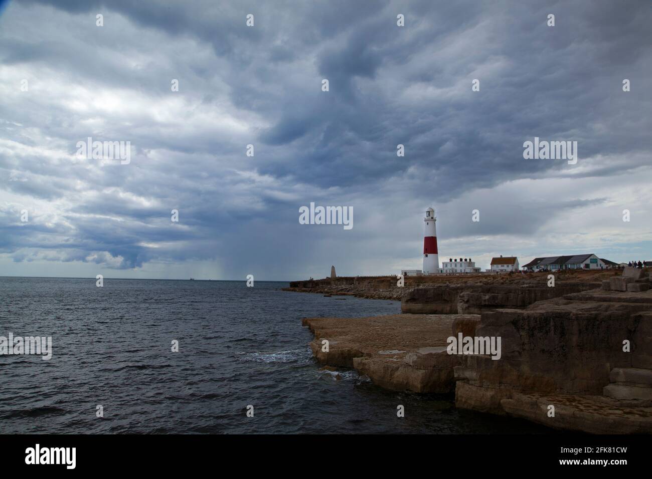 Portland Bill lighthouse, Dorset, England, UK, copy space showing rocks ...