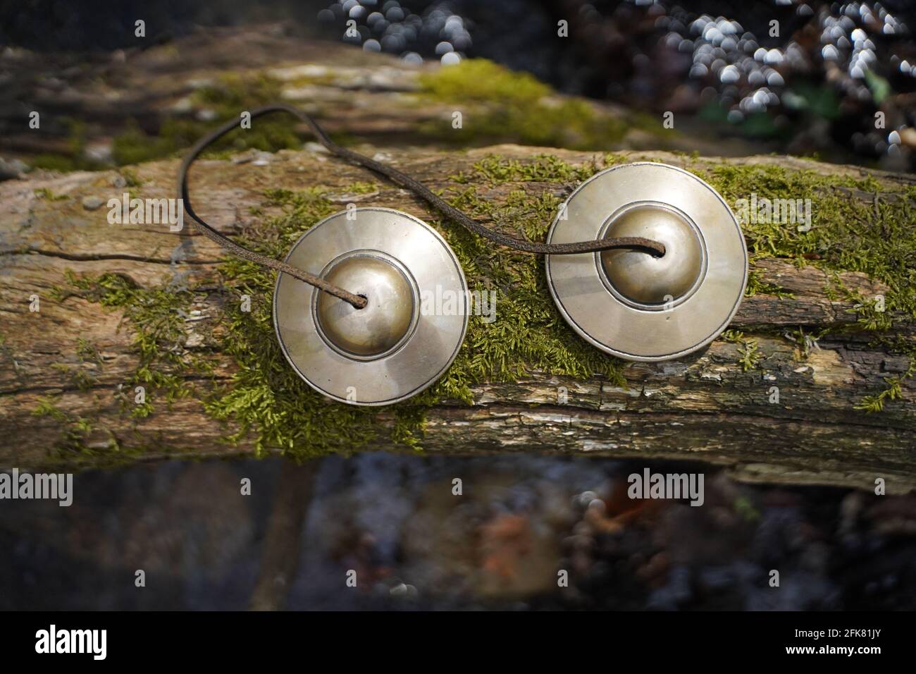 Cymbals close up for sound healing therapy Stock Photo - Alamy