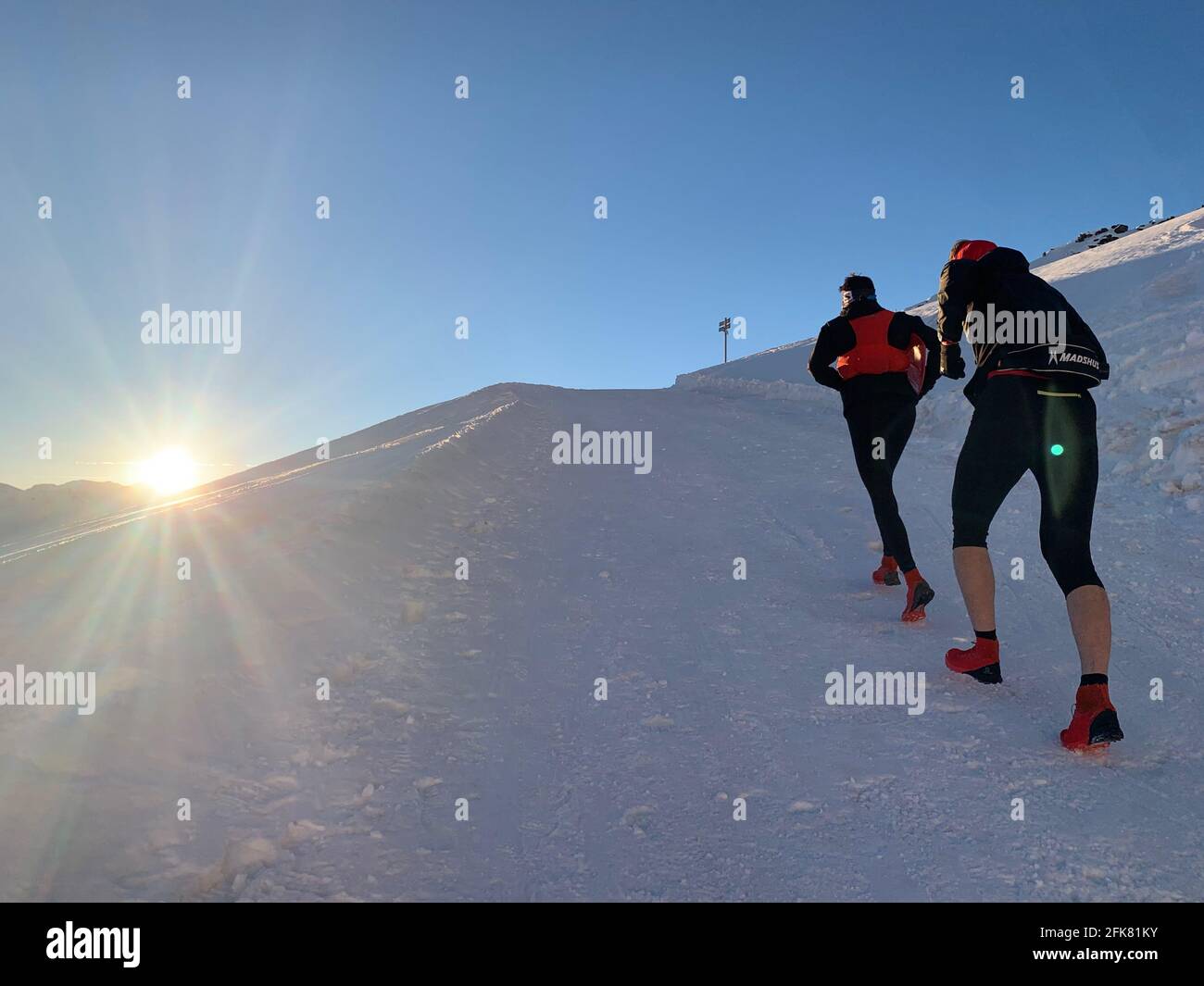 Ascending steep snow slope hi-res stock photography and images - Alamy