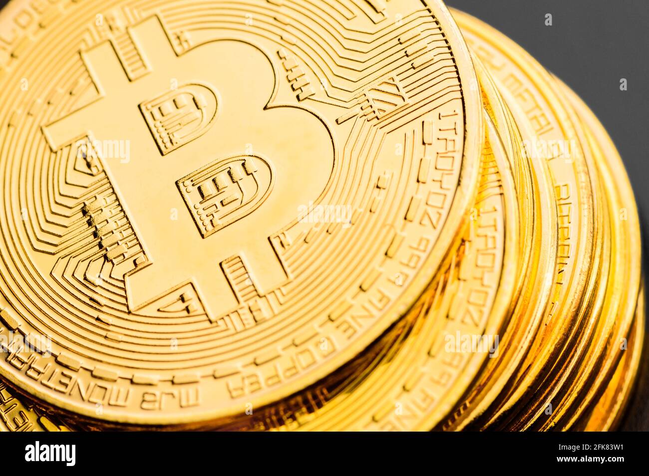Macro view of gold color shiny coins with bitcoin symbol Stock Photo ...