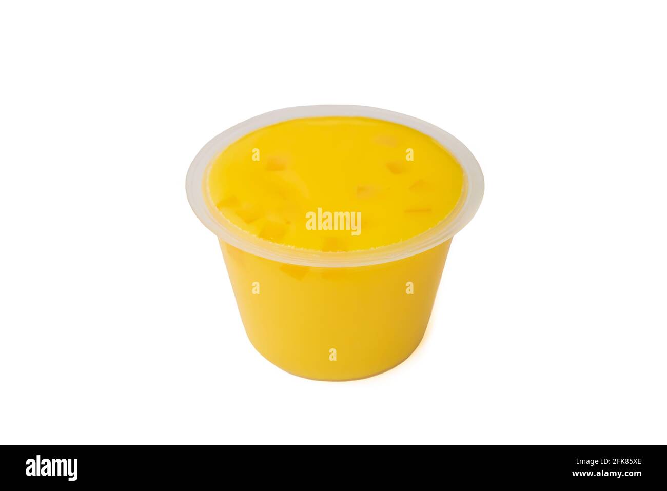 Yellow mango pudding, a close up of sweet mango mousse dessert in ...