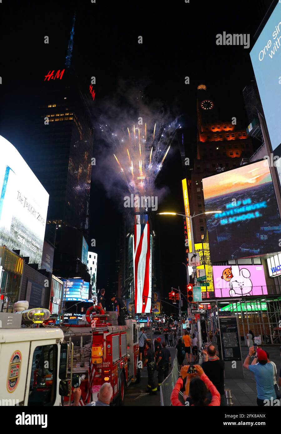 New York - NY - 20200701 Pedestrians watch the Macy's fireworks on top ...