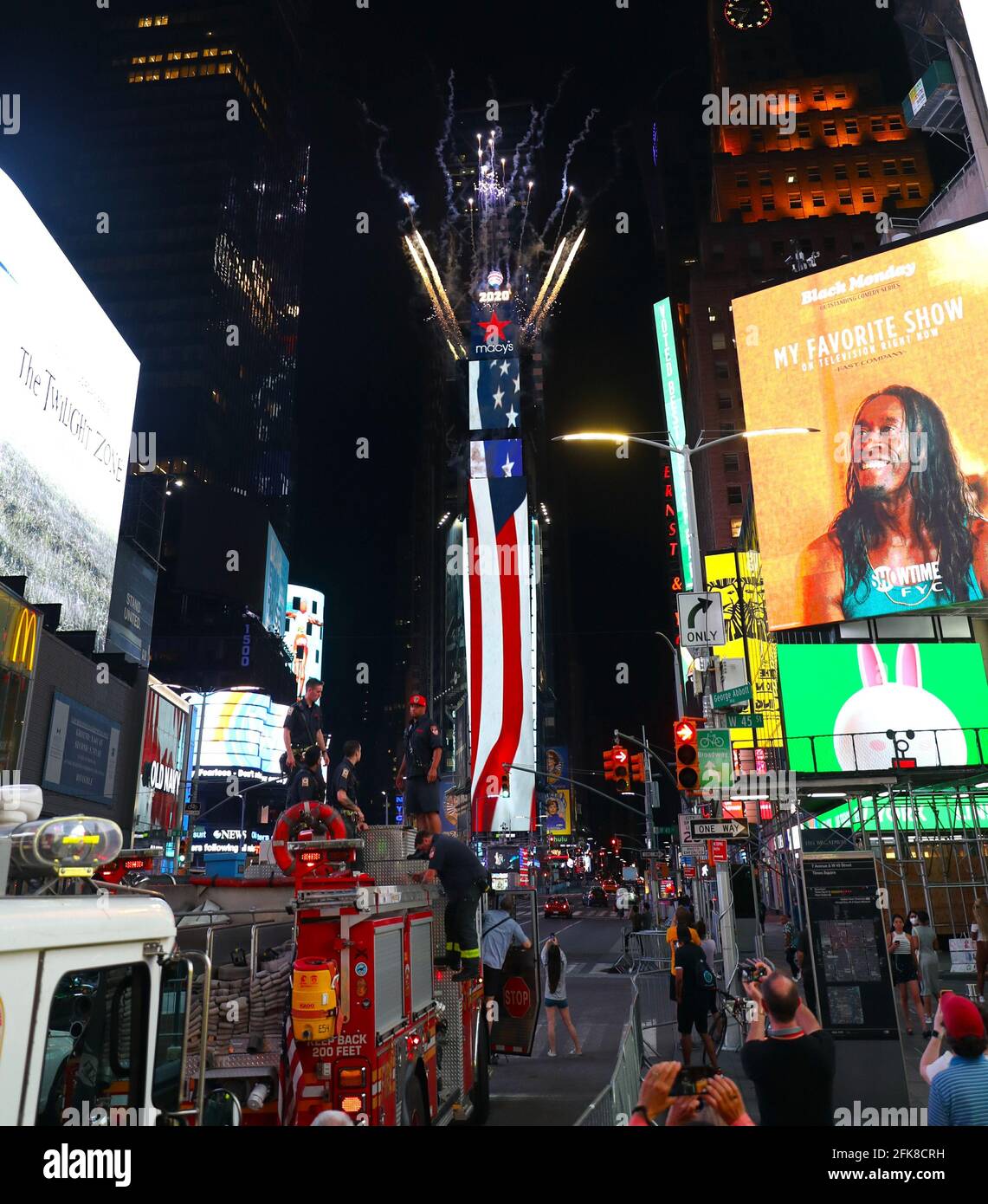 New York - NY - 20200701 Pedestrians watch the Macy's fireworks on top ...