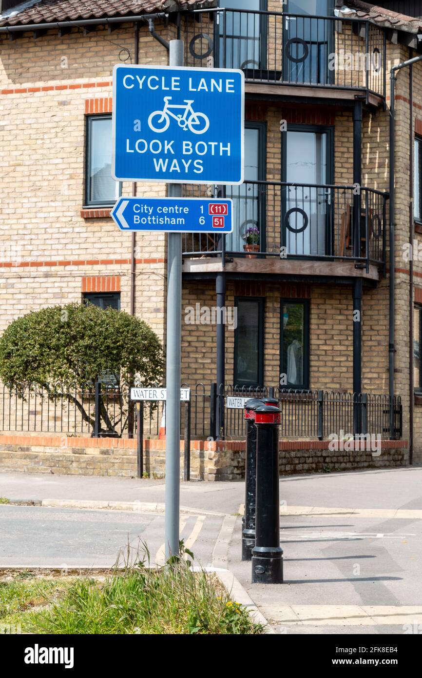 Cycle lane sign encouraging road users to Look Both Ways. Beneath is a ...