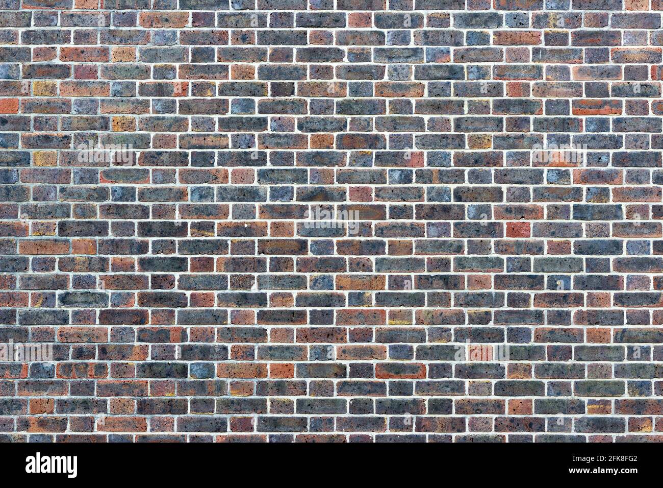 Abstract of a multicoloured brick wall background texture Stock Photo ...