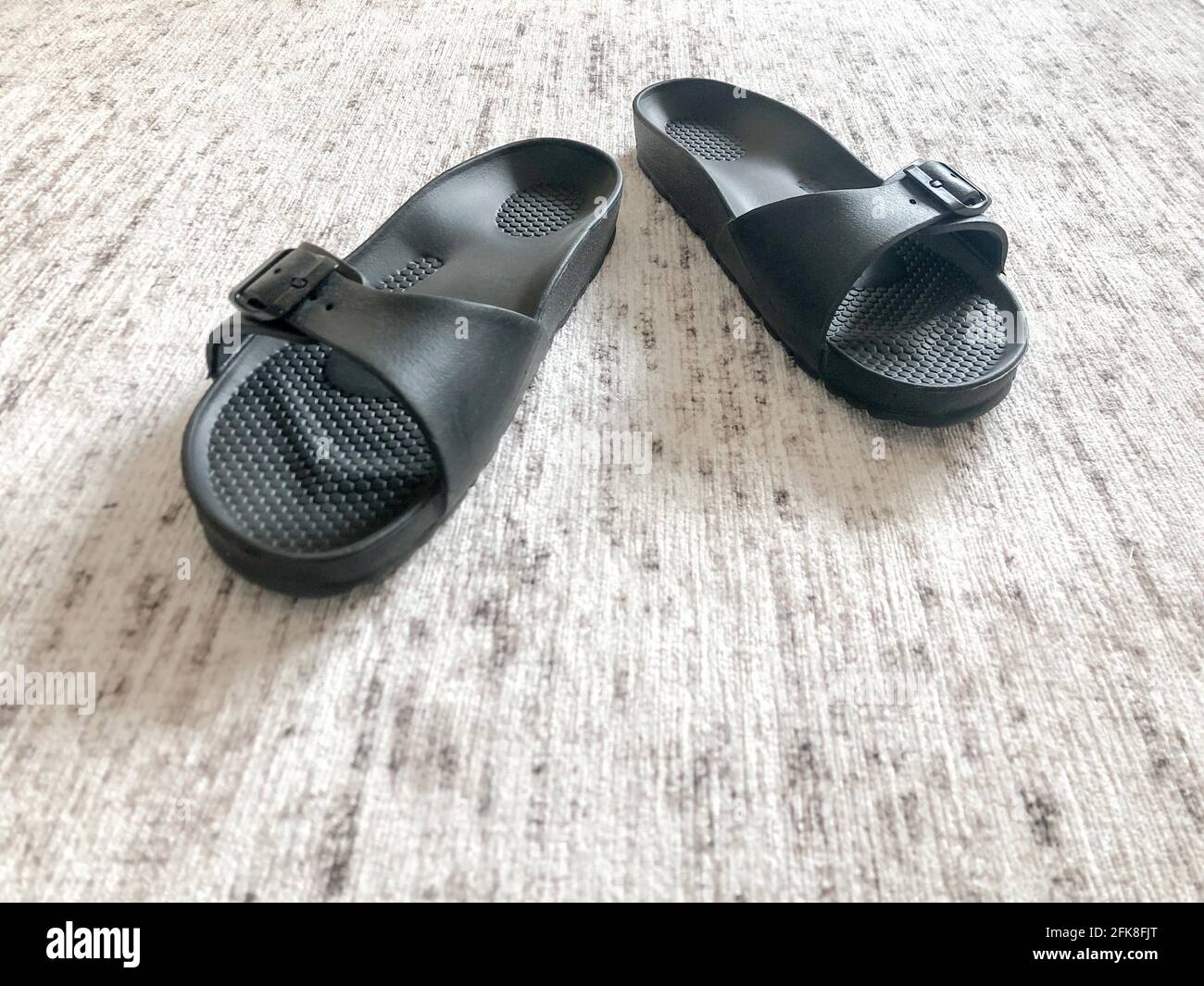 Black slippers hi-res stock photography and images - Alamy