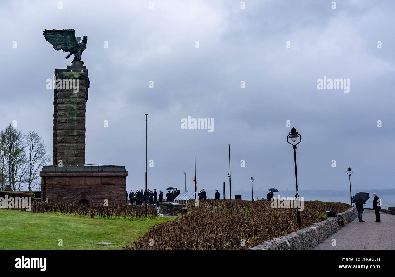 Heikendorf, Germany. 29th Apr, 2021. Rain clouds pass over the memorial ...