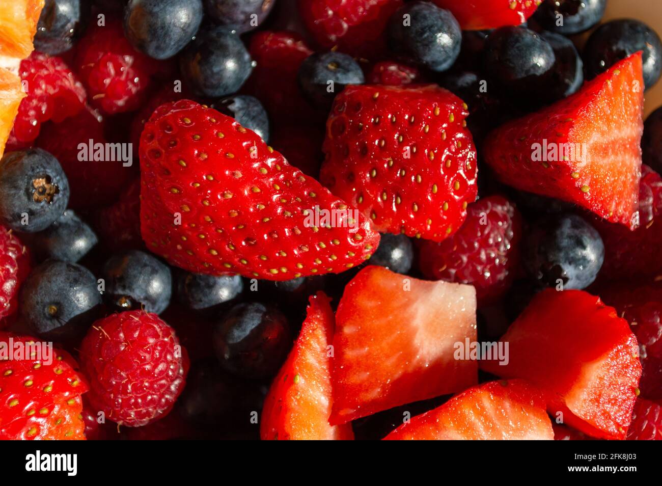 Mix of fresh red fruits, full of healthy vitamins and nutrients Stock ...