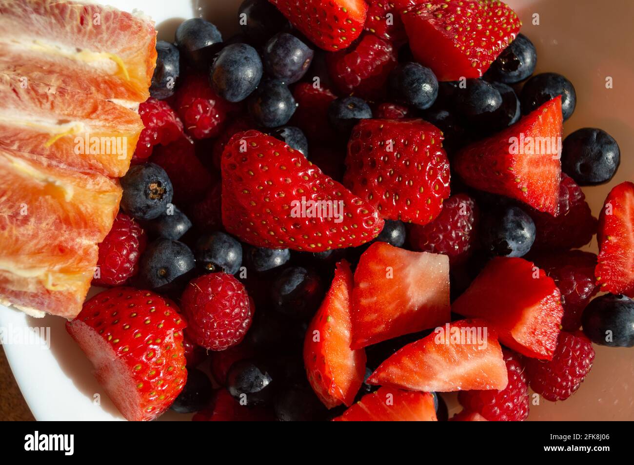 Mix of fresh red fruits, full of healthy vitamins and nutrients Stock ...